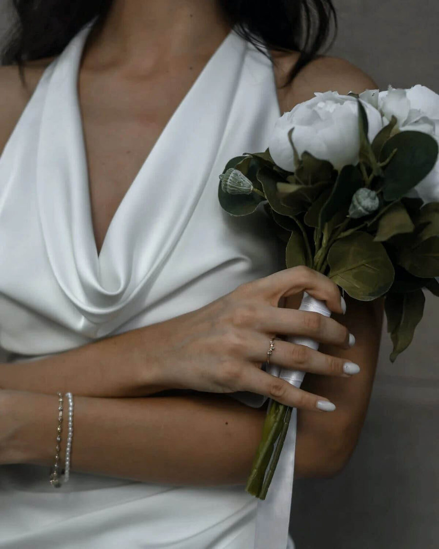 A cherished locket, once lustrous, now whispers tales of decay.